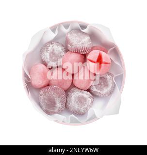 Many different delicious mochi in box on light blue background, closeup ...
