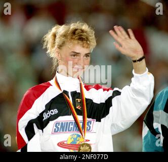 Germany's Heike Drechsler smiles after winning the gold medal in the ...