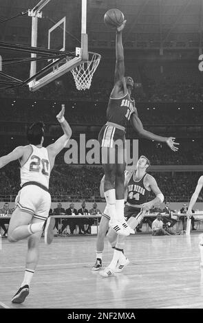 Boston Celtics Larry Siegfried, (20), overruns ball in scramble with ...