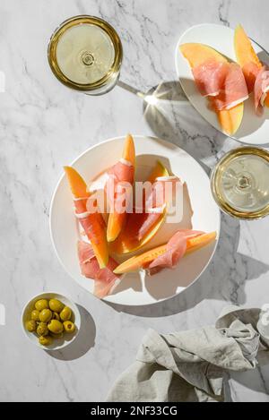 melon with parma and a glass of wine. High quality photo Stock Photo ...