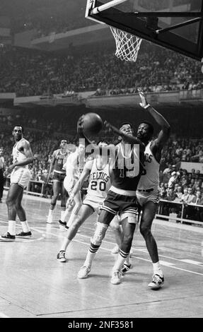 Boston Celtics Larry Siegfried, (20), overruns ball in scramble with ...