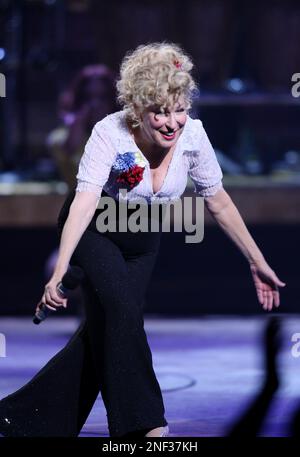 Bette Midler sings during the 100th performance of "The Showgirl Must ...