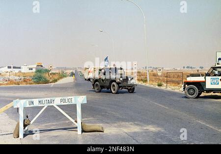 British troops, ferret cars and Saracen light tanks arriving at Nicosia ...