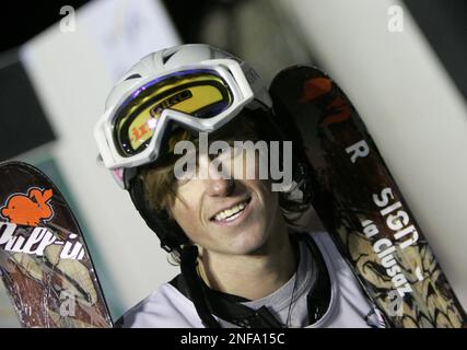 Xavier Bertoni, of France, celebrates on the podium after winning the ...
