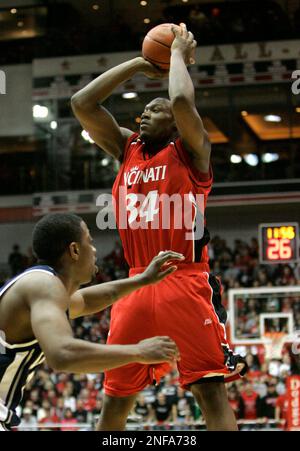 Cincinnati forward Yancy Gates (34) in action against DePaul forward ...