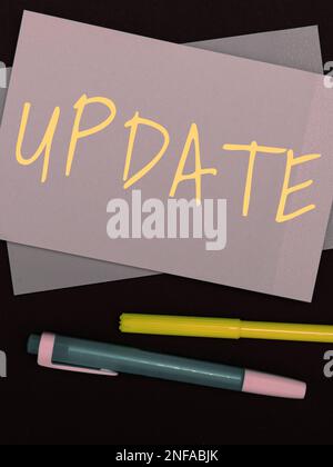 Sign displaying Update. Business showcase Up to date Make something ...