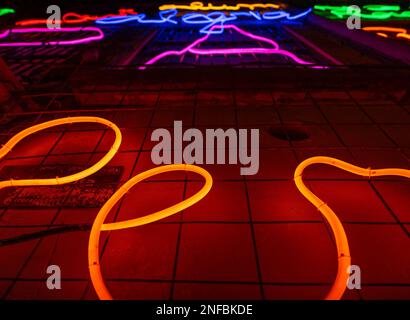 Illuminated letters and words made with neon lights and LEDs of many ...