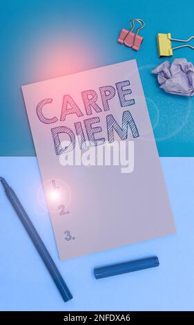 Text caption presenting Carpe Diem. Word Written on public festival ...