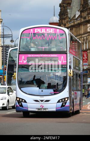 Double Decker bus in Leeds City Centre Stock Photo - Alamy