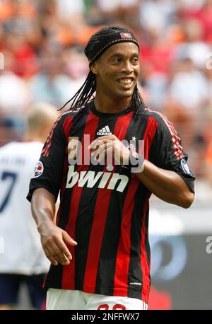 AC Milan's Brazilian forward Ronaldihno controls the ball during an ...