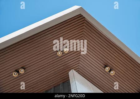 PVC ceiling panel covered with wood-like vinyl with modern lighting ...