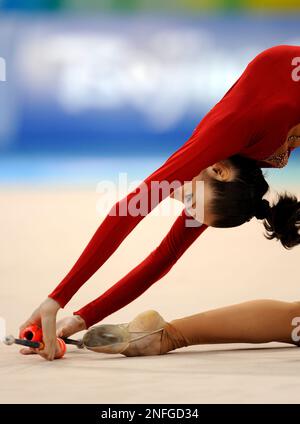 Ukraine's Anna Bessonova performs with clubs during the European ...