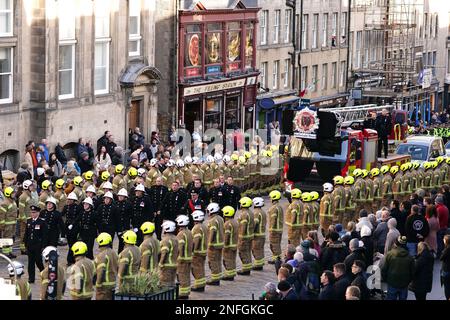 The coffin of Barry Martin arrives on a fire engine outside St Giles ...