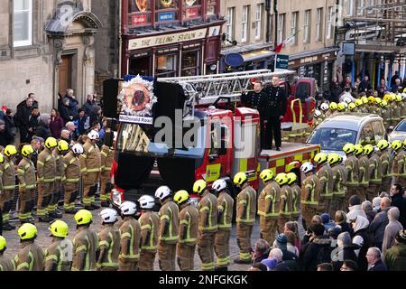 The coffin of Barry Martin arrives on a fire engine outside St Giles ...