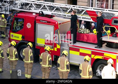 The coffin of Barry Martin arrives on a fire engine outside St Giles ...