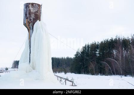 frozen water tower. The water turned to ice. Abnormal cold Stock Photo ...