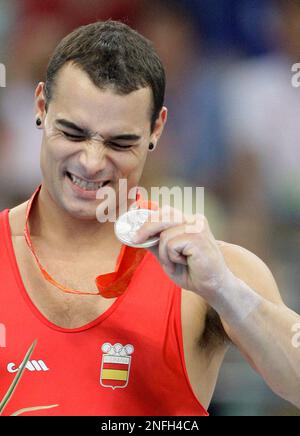 Spain's gymnast Gervasio Deferr poses with his silver medal for his ...