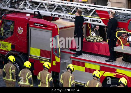 The coffin of Barry Martin arrives on a fire engine outside St Giles ...