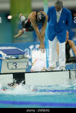 U.S. swimmer Dara Torres dives into the pool for her leg in the women's ...