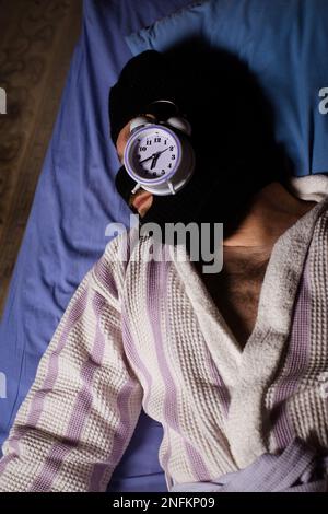 Thief stealing a clock Stock Photo - Alamy