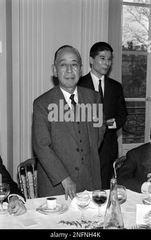 Prime Minister Nobusuke Kishi of Japan (center), on a visit to the ...