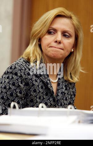 Dina Matos McGreevey looks across the court room as she listens to ...