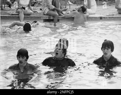 The Beatles, working on a movie in Nassau, Bahamas, went swimming in a ...