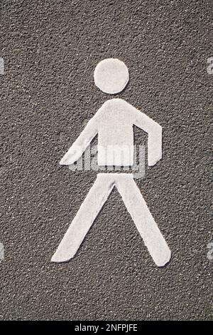 Pedestrian pictogram symbol road marking on asphalt Stock Photo - Alamy
