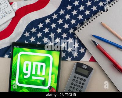 In this photo illustration, the General Motors Company (GM) logo is ...