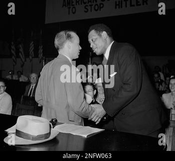 Singer Paul Robeson, right, his son Paul Jr. and daughter-in-law ...