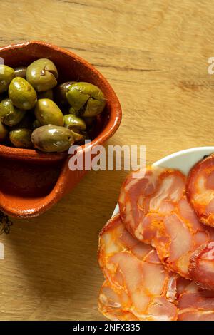 Plate with slices of paio. Paio is a traditional pork sausage from the ...