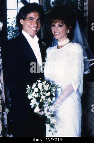 Dr. Harry Glassman looks at his wife, "Dallas" star U.S. American ...