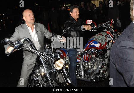 Actors Bruce Willis, left, and Sylvester Stallone ride motorcycles ...