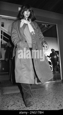 32-year-old Marianne Bachmeier, holds some files as she enters a ...