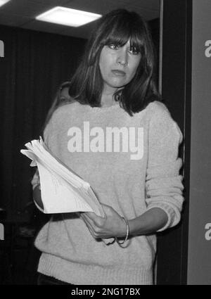 32-year-old Marianne Bachmeier, holds some files as she enters a ...