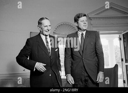General Douglas MacArthur posing in front of his C-54 Skymaster plane ...