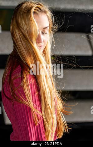 Rhianna Martin, a blonde woman spends the day having her picture taken ...