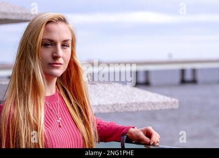 Rhianna Martin, a blonde woman spends the day having her picture taken ...