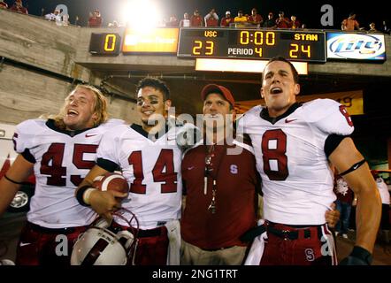 Stanford's Ben Ladner, Tavita Pritchard, coach Jim Harbaugh, and Evan ...