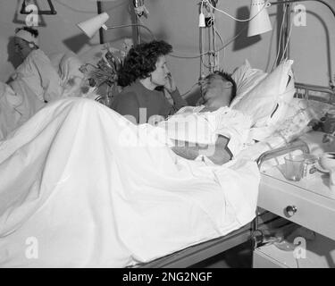 Manchester United goalkeeper Ray Wood falls, Real Madrid 's outside ...