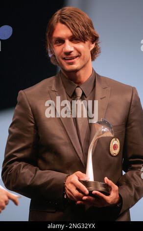 Italian soccer player, Paolo Maldini, shows off his toned physique as ...