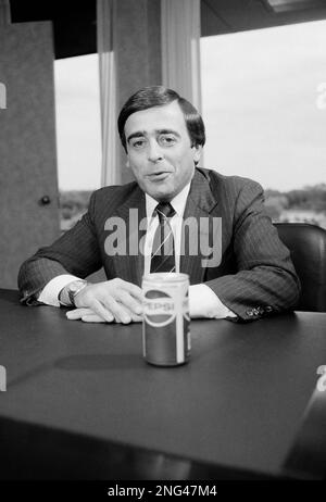 Roger Enrico, chairman of Pepsi USA, relaxes in his office in Purchase ...