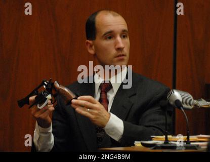 James Carroll, a criminalist for the Los Angeles County Sheriffs ...
