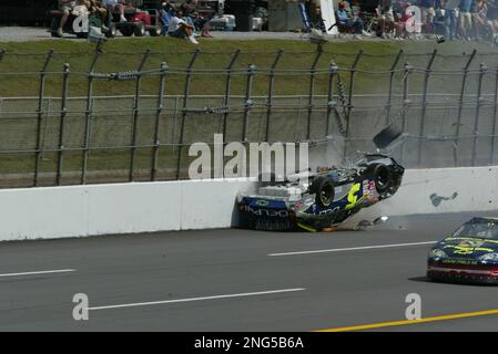 Driver Kyle Busch (5) wrecks on the back stretch during the 27th lap of ...