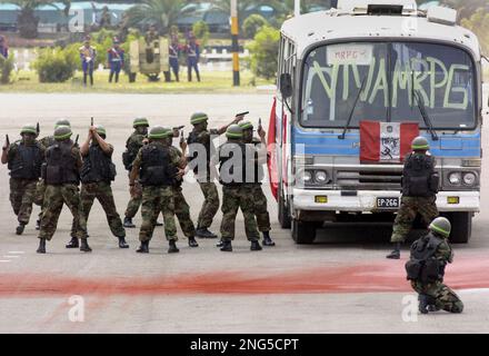 Army soldiers simulate a hostage-rescue situation during the 10th ...