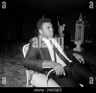 Boxing - Muhammad Ali. Muhammad Ali talks to reporters sporting a ...