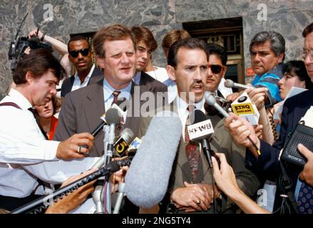 Theodore Briseno, left, and his lawyer, Harland Braun, arrive at the ...
