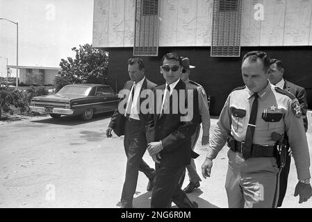 Dr. Carl A. Coppolino and his second wife Mary leave court at Naples ...