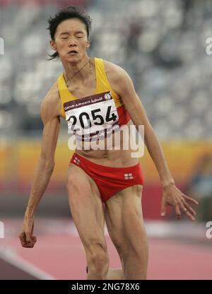 China's Xie Limei competes in the final of the Women's Triple Jump at ...