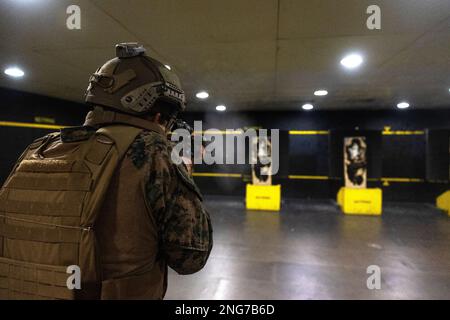 U.S. Marine Corps Sgt. Brian Wu, center, a joint terminal attack ...